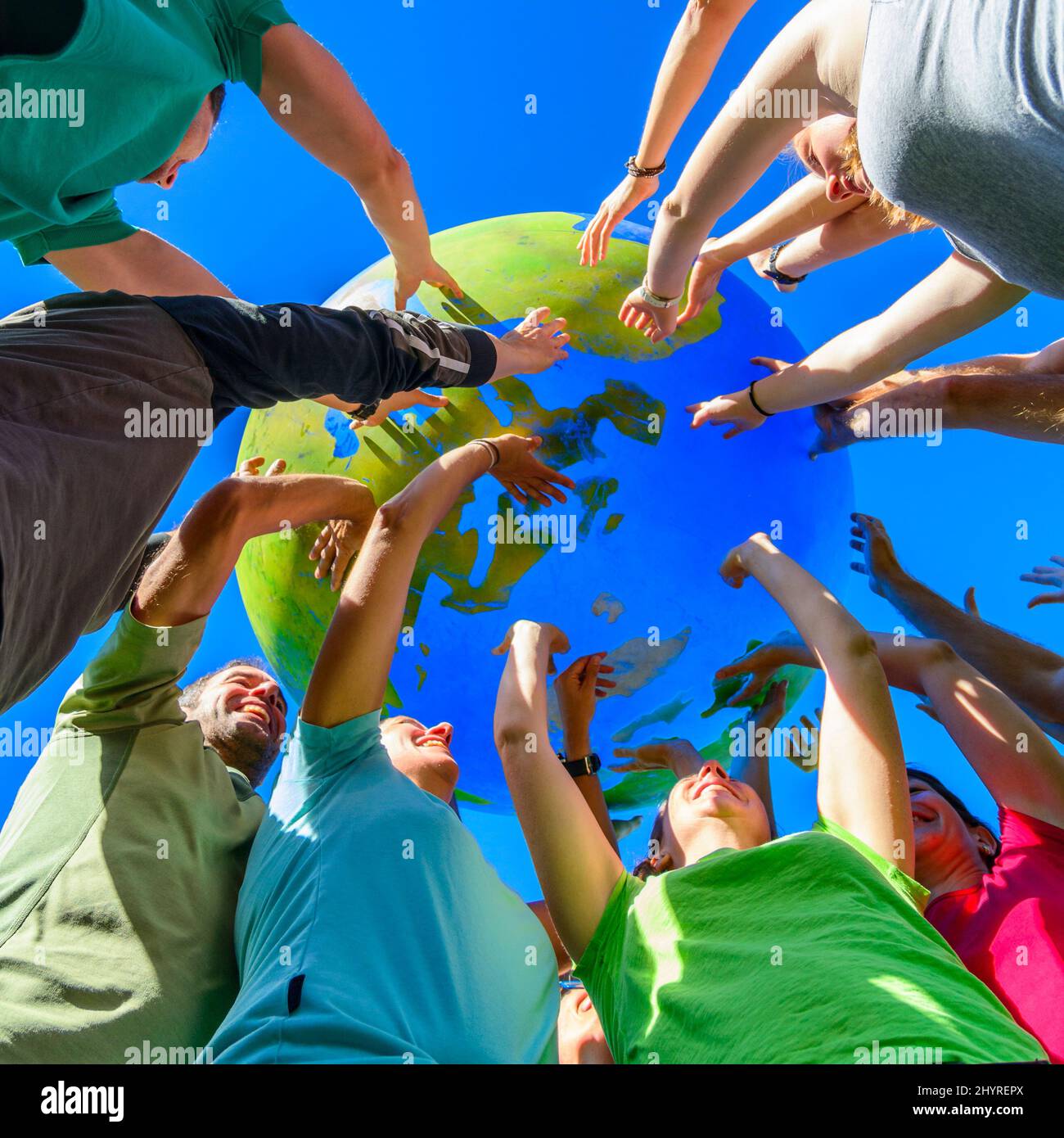 Let us carry the world on our hands Stock Photo - Alamy