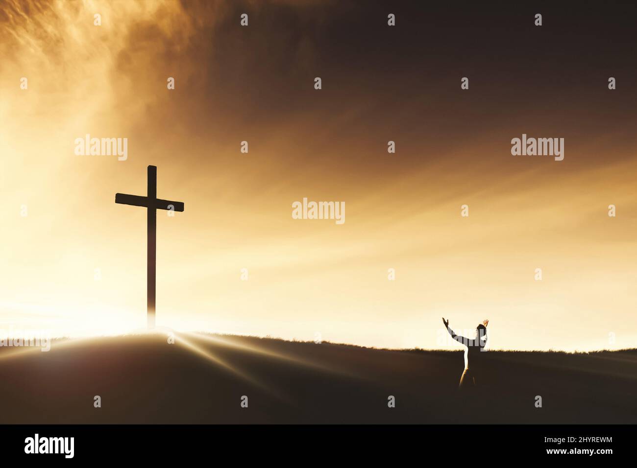 A person praying, praising and worshiping with both hands raised ...
