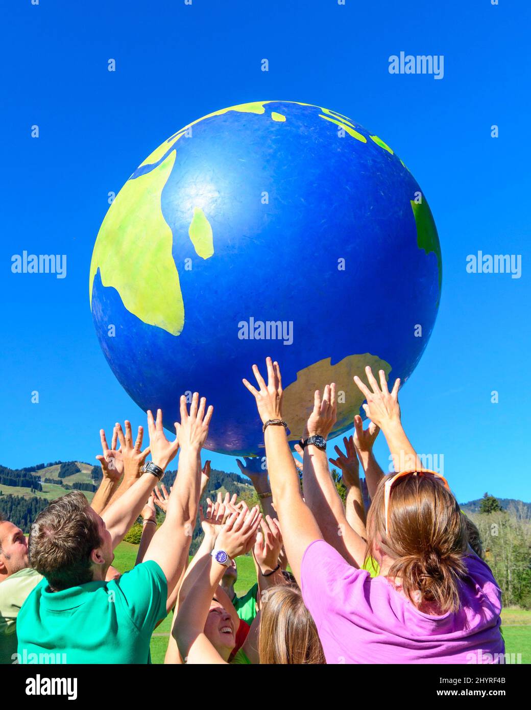 Carry the world hi-res stock photography and images - Alamy