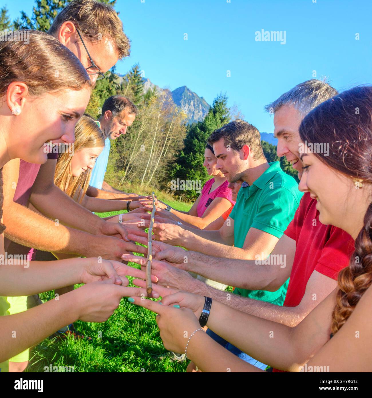 A group during a team-building exercise - teamwork ultimately brings ...