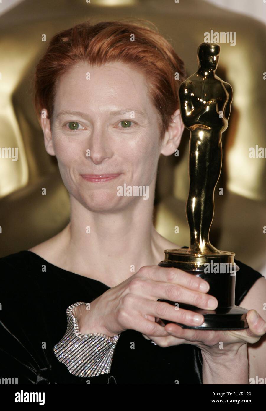 Tilda Swinton with the award for Actress in a Supporting Role received ...