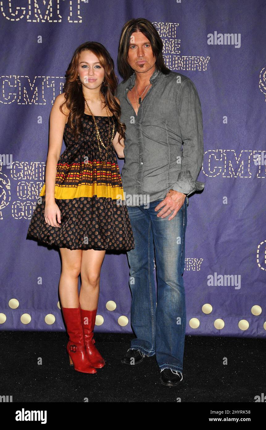 Miley Cyrus and Billy Ray Cyrus in the press room at the 2008 CMT Music ...