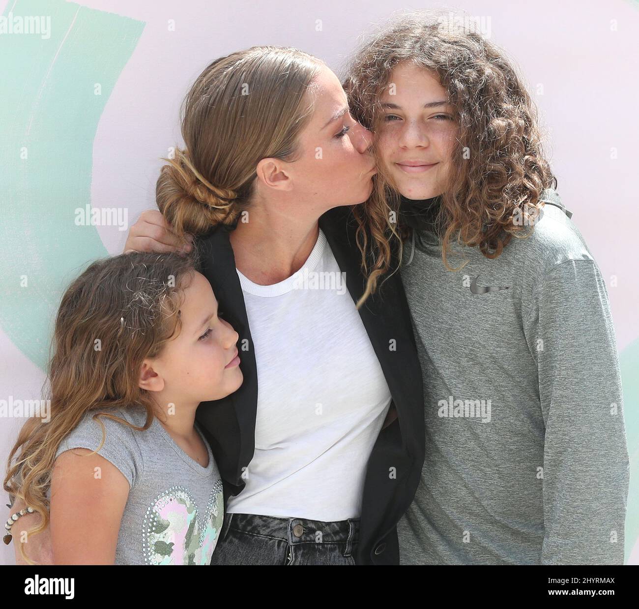 Kendra Wilkinson, Alijah Baskett and Hank Baskett IV celebrating the ...