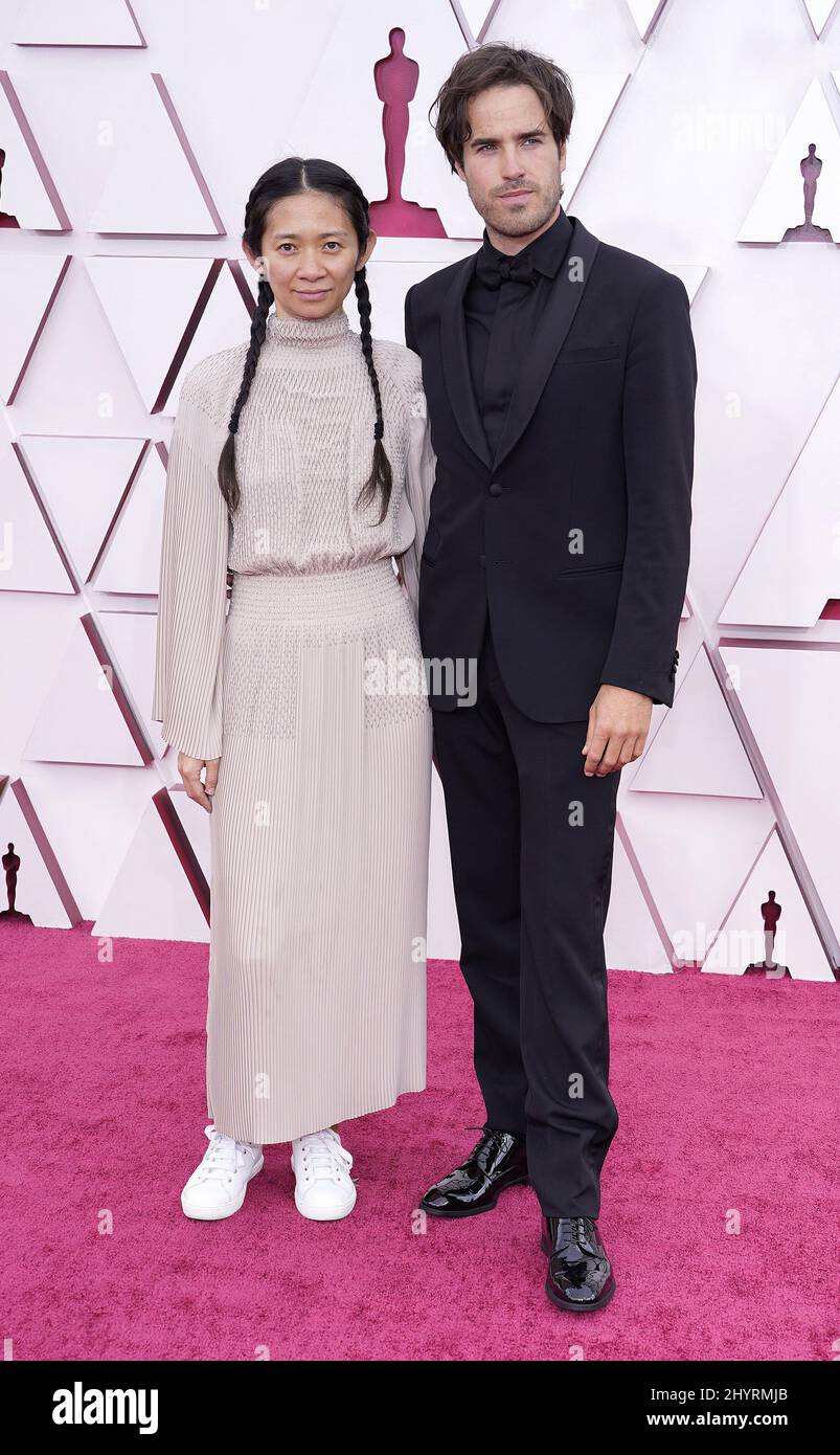 Chloe Zhao and Joshua James Richards at the 93rd Annual Academy Awards ...
