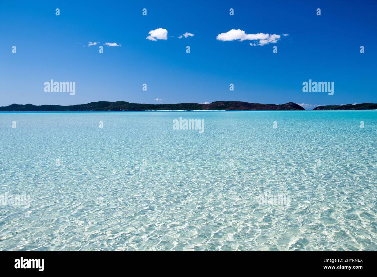 Crystal clear water on a wonderful beach. Shallow ocean water with ...