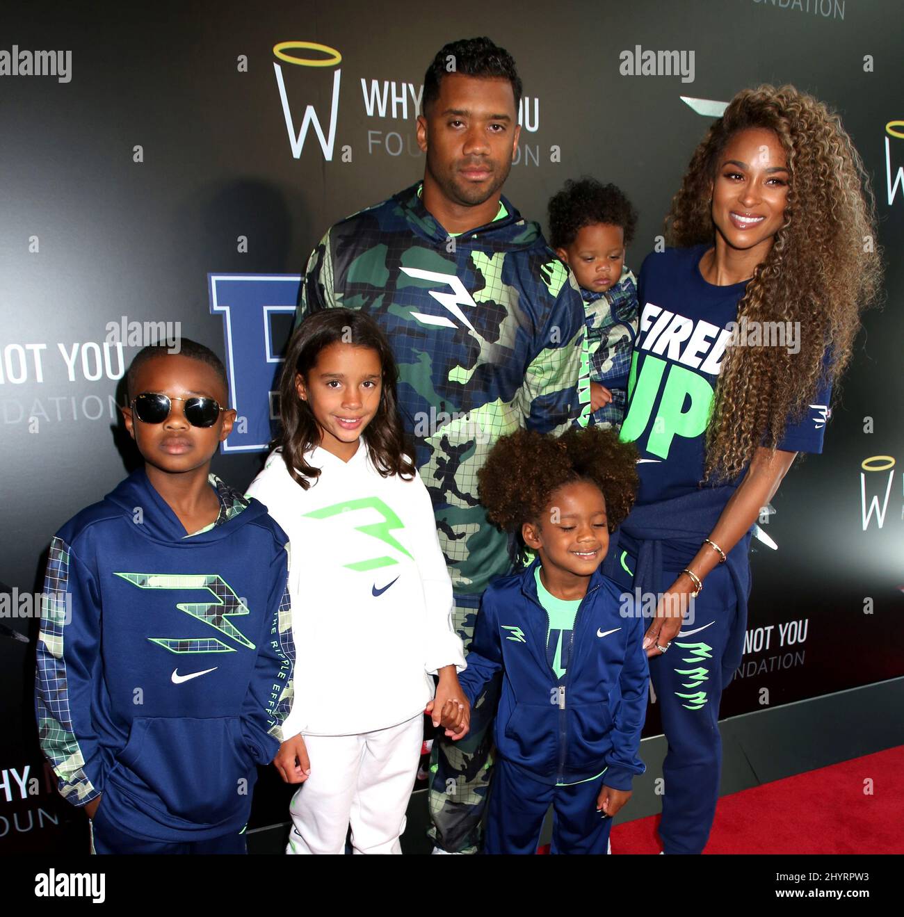 Russell Wilson, Ciara & children attending Russell Wilson & Ciara ...