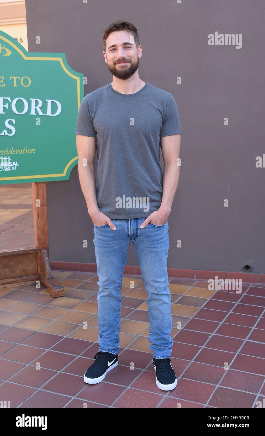 Dustin Milligan attending a photocell in Los Angeles, California Stock ...