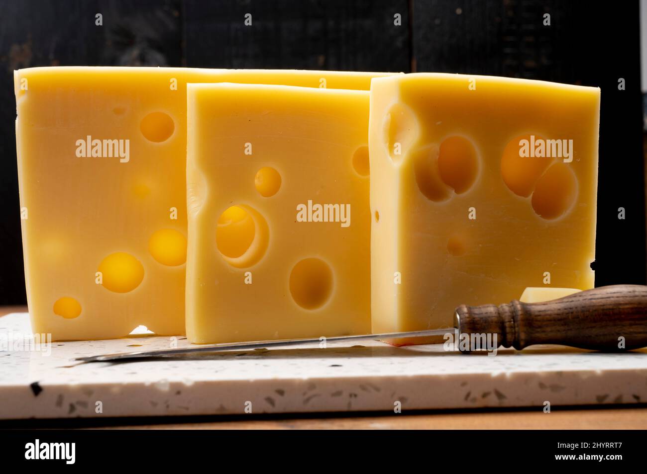 Swiss cheese collection, yellow emmentaler or emmental cheese with ...