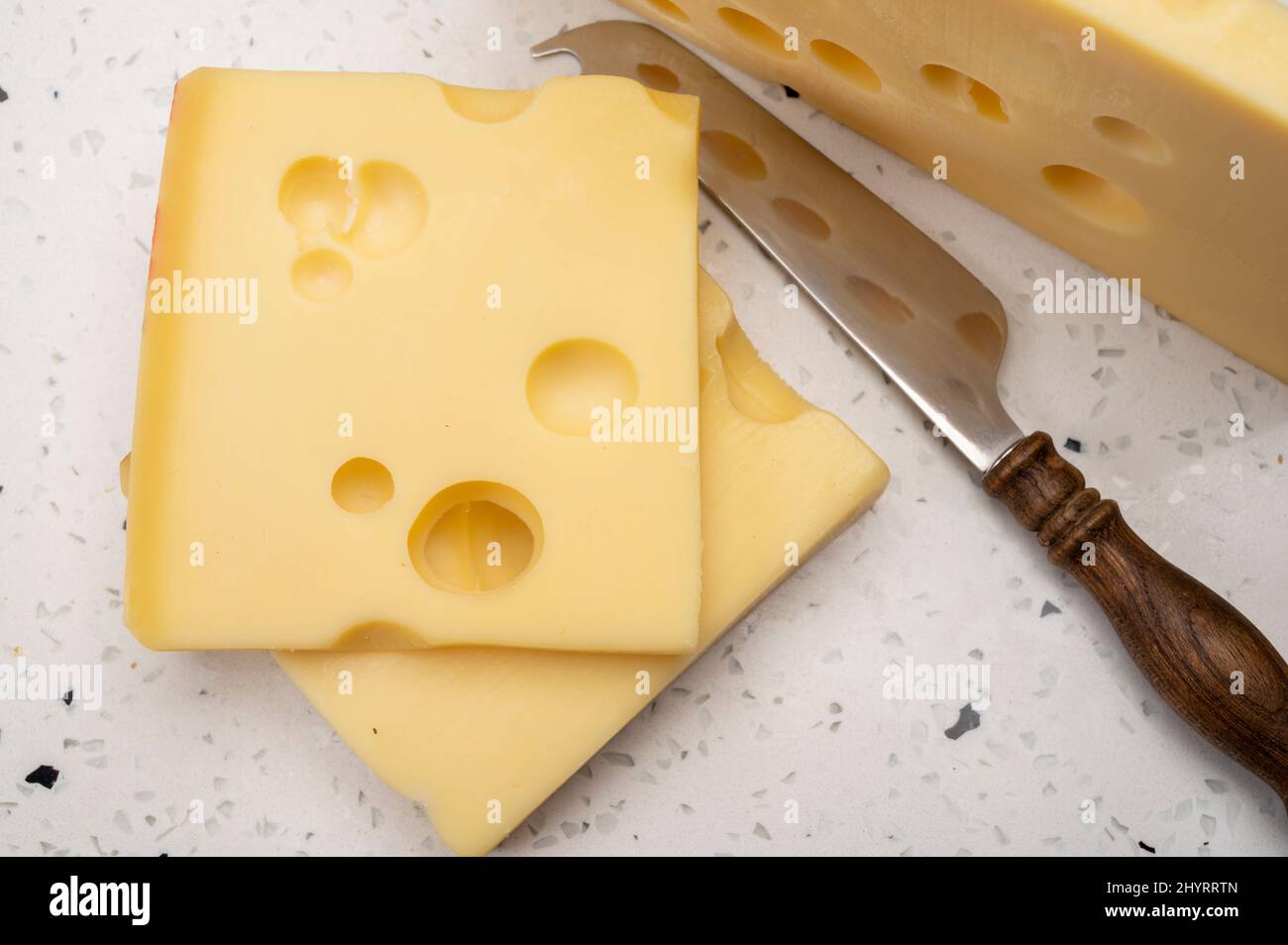 Swiss cheese collection, yellow emmentaler or emmental cheese with ...