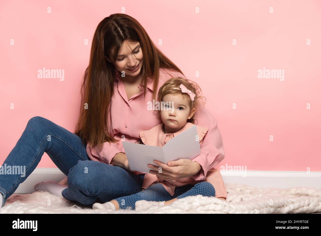 Support and care. Young woman and little girl, mother and daughter ...