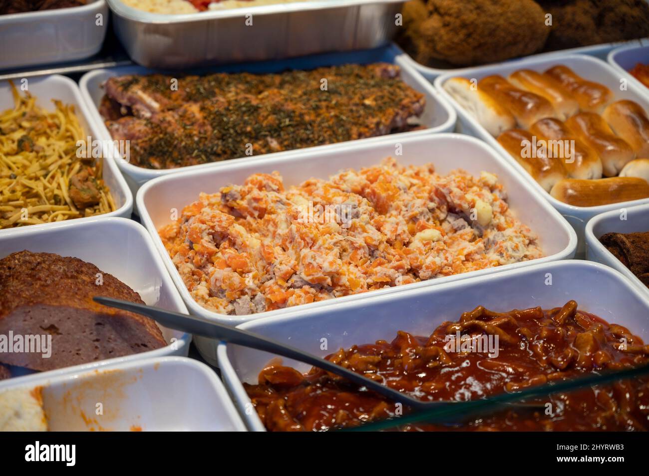 Assortment of gourmet meat dishes in butchery delicatessen shop, food ...