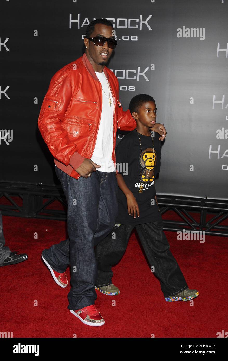 Sean Combs and sons attending the Hancock premiere at Grauman's Chinese ...