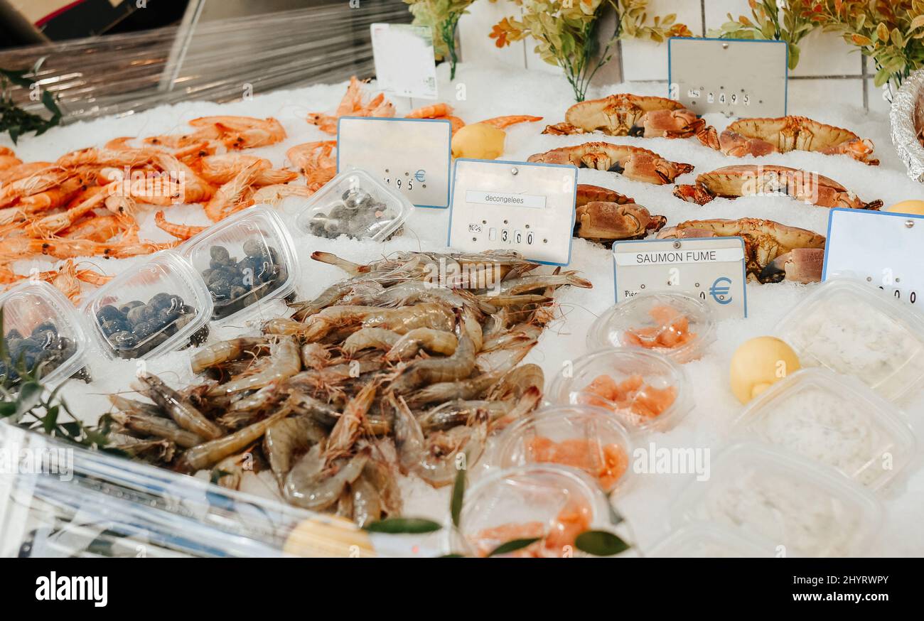Seafood stall on the street, salmon, shrimp and white fish, a large ...
