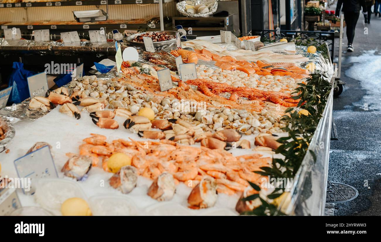 Seafood stall on the street, salmon, shrimp and white fish, a large ...