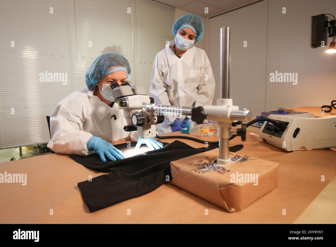 Forensic Examiners show the traditional method of detecting blood ...