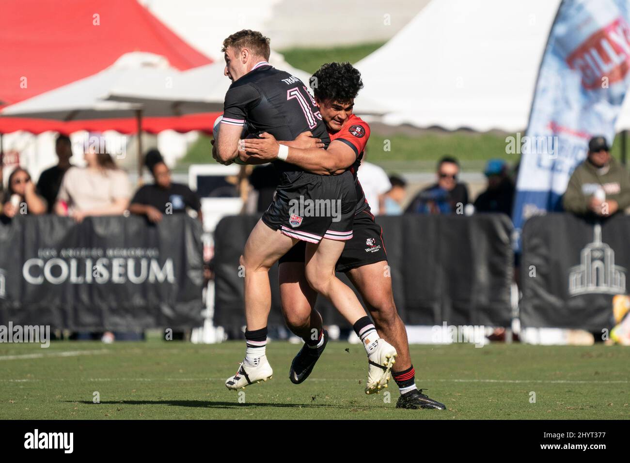 Utah Warriors center Tomasi Tonga (12) makes a tackle on Los Angeles ...