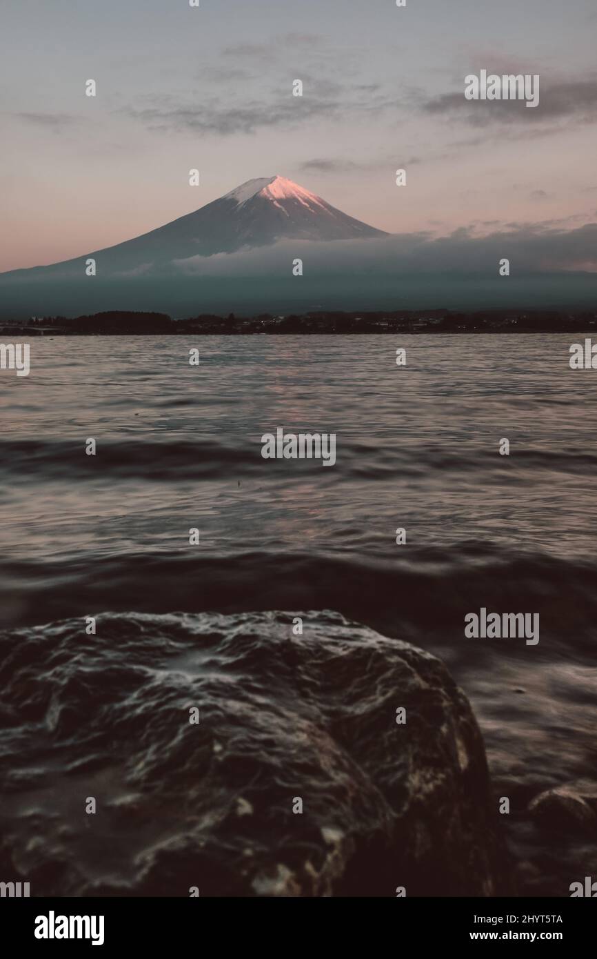 Beautiful view of Mount Fuji under the cloudy skies Stock Photo - Alamy