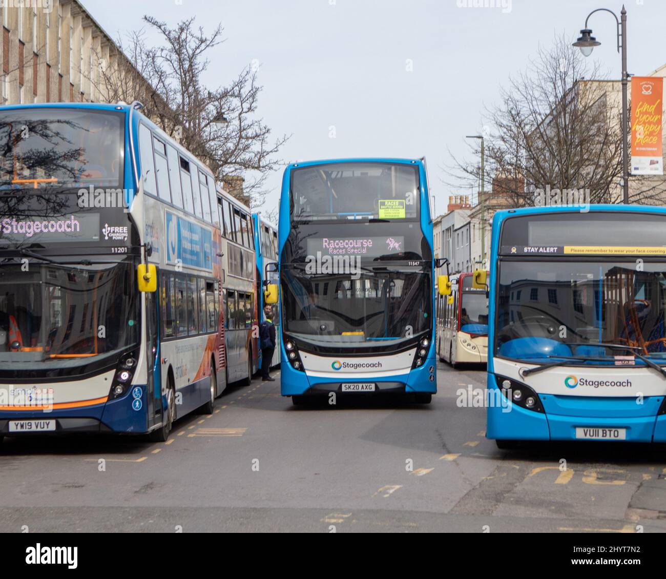 Cheltenham, UK. 15th Mar, 2022. A line of buses on the High street in ...