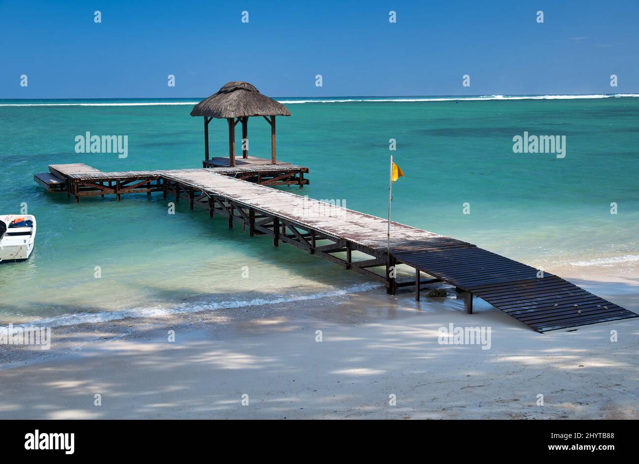 Beautiful wooden pier at ocean border Stock Photo - Alamy