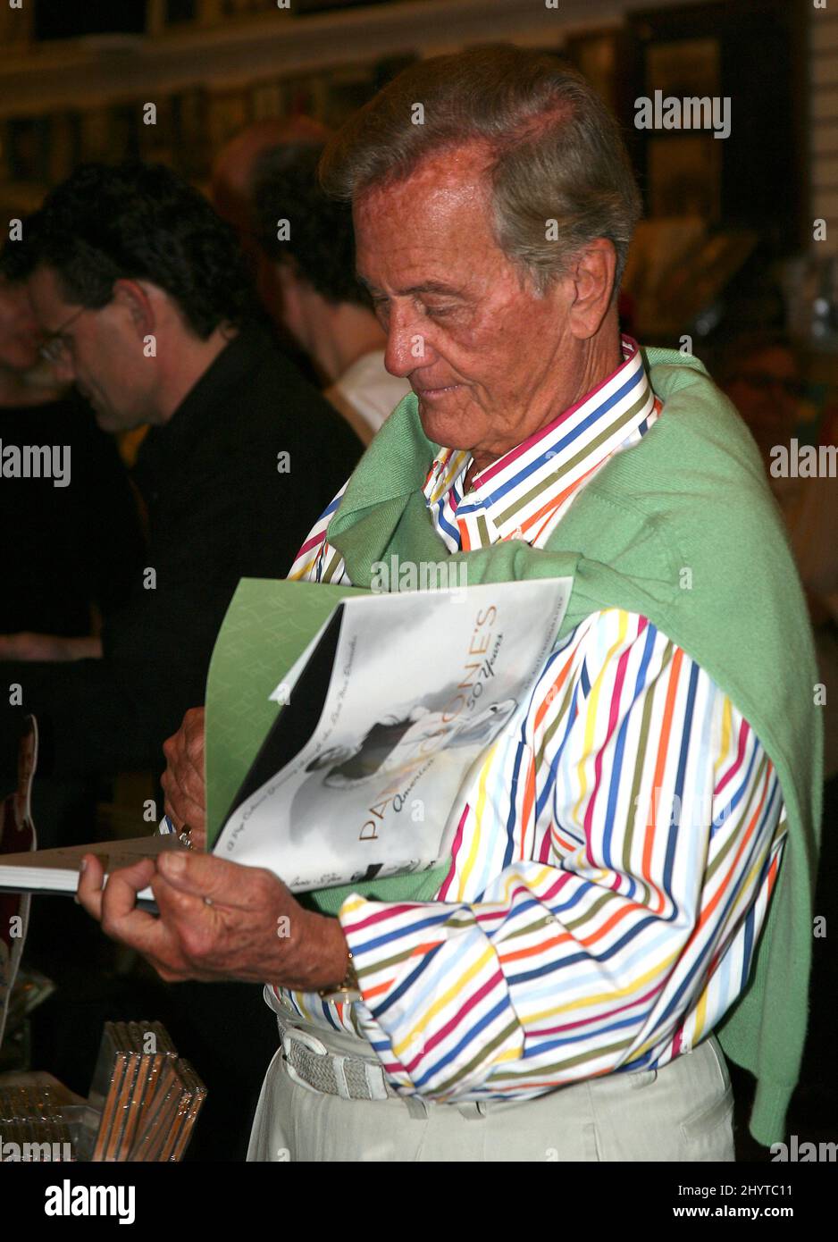 Pat Boone signs copies of his CD, "The True Spirit of Christmas" at the ...
