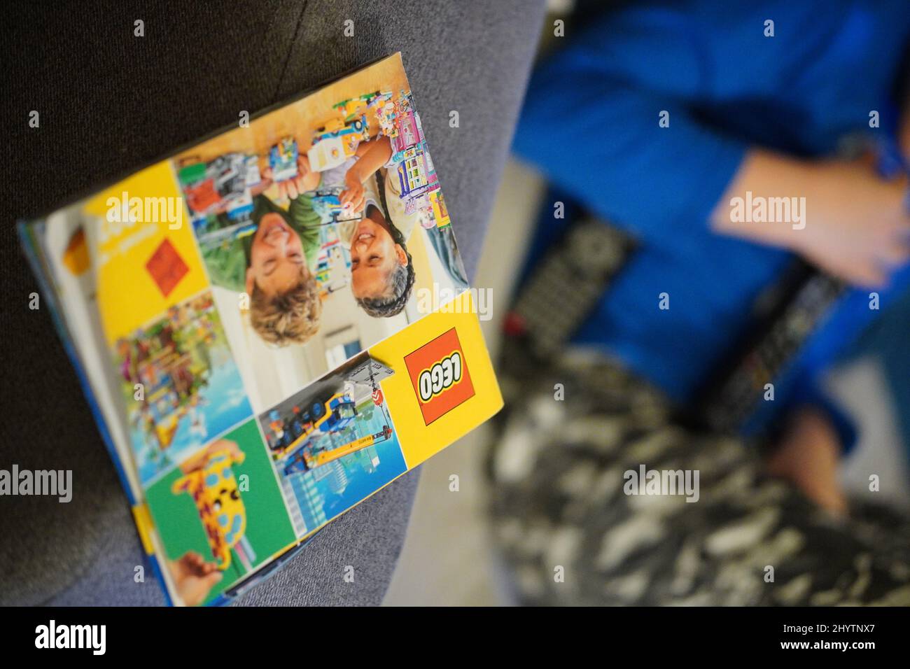 Lego brand brochure on a sofa Stock Photo - Alamy