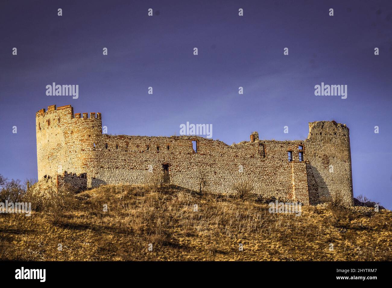 Landscape of an antique fortress with blue sky above it Stock Photo - Alamy