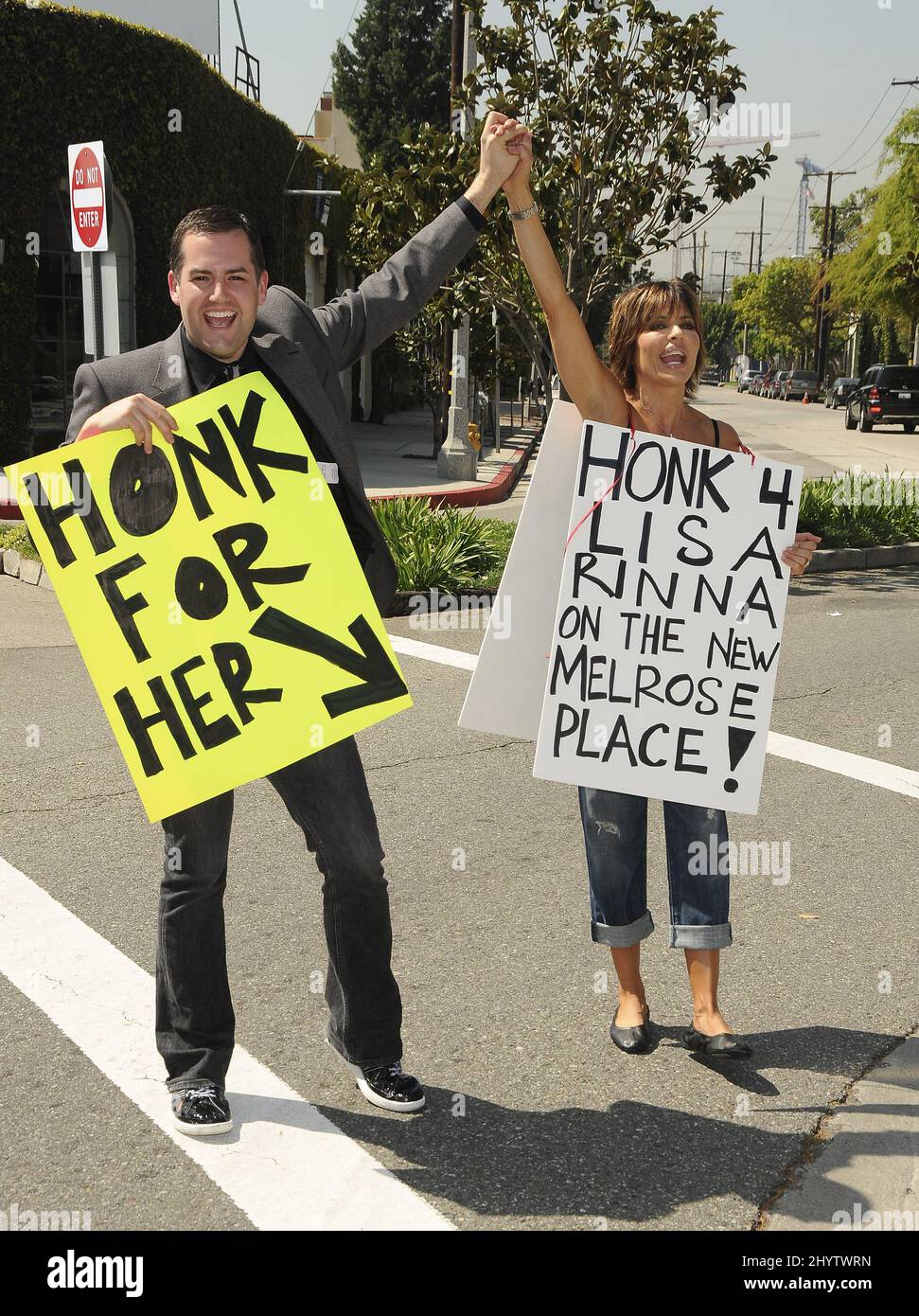 Lisa Rinna and Ross Mathews pose for the camera as Lisa starts her ...