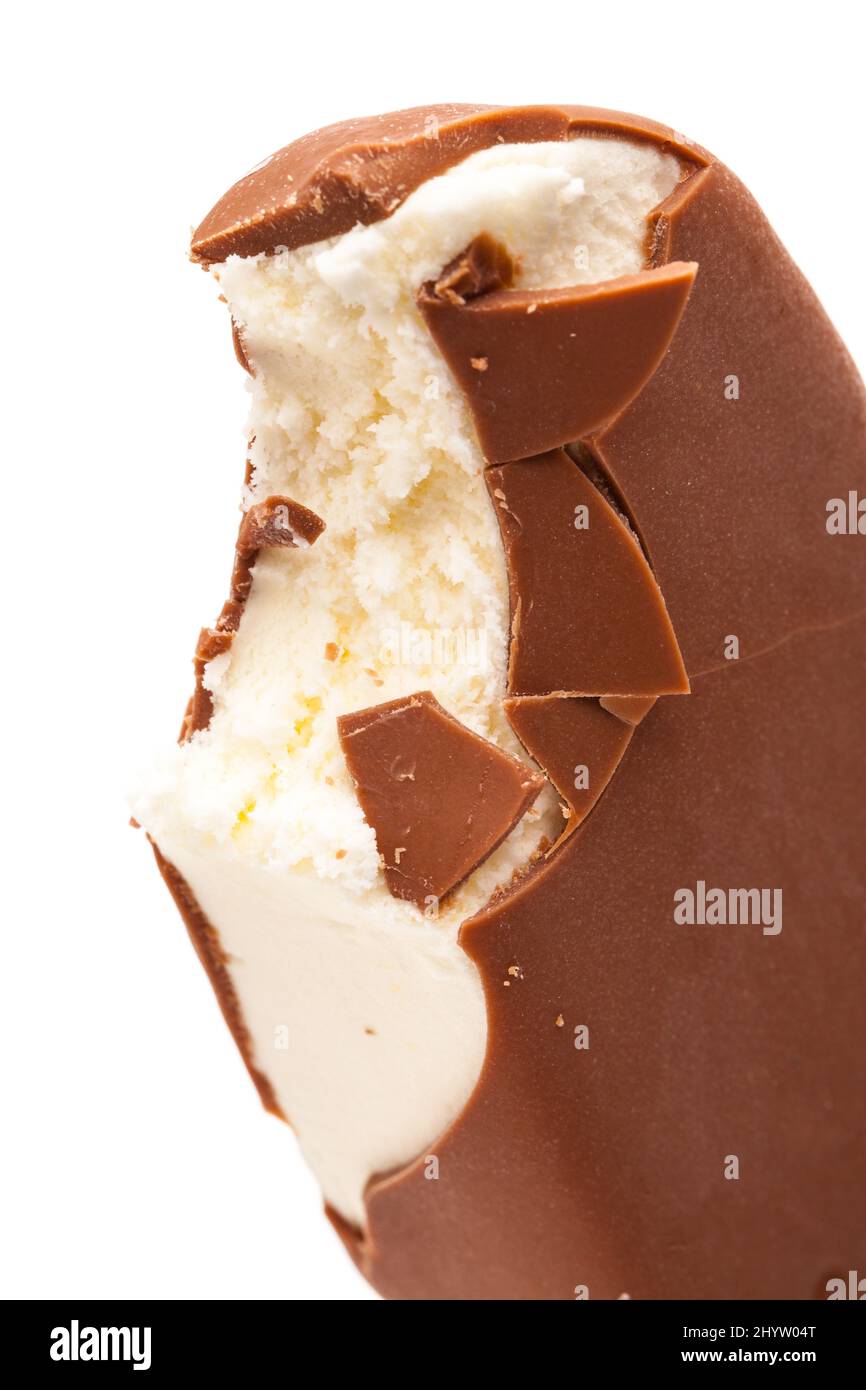 Extract of vanilla ice cream with chocolate coating Stock Photo - Alamy