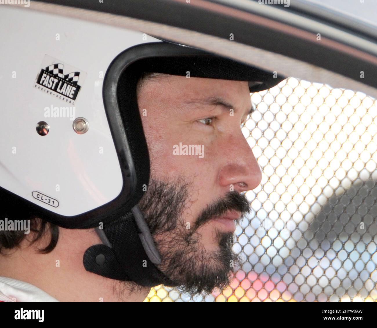 Keanu Reeves at the 33rd Annual Toyota Pro/Celebrity Race practice day ...