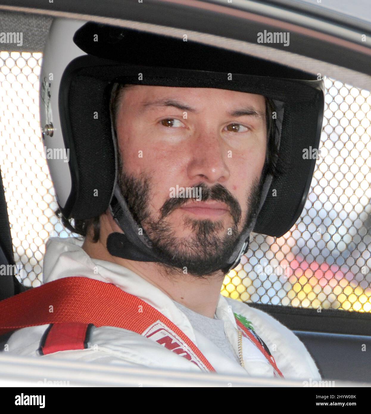 Keanu Reeves at the 33rd Annual Toyota Pro/Celebrity Race practice day ...