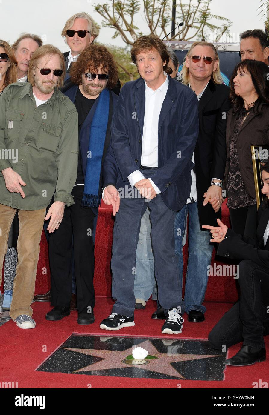 Tom Petty, Jeff Lynne, Paul McCartney and Dhani Harrison at a ceremony ...