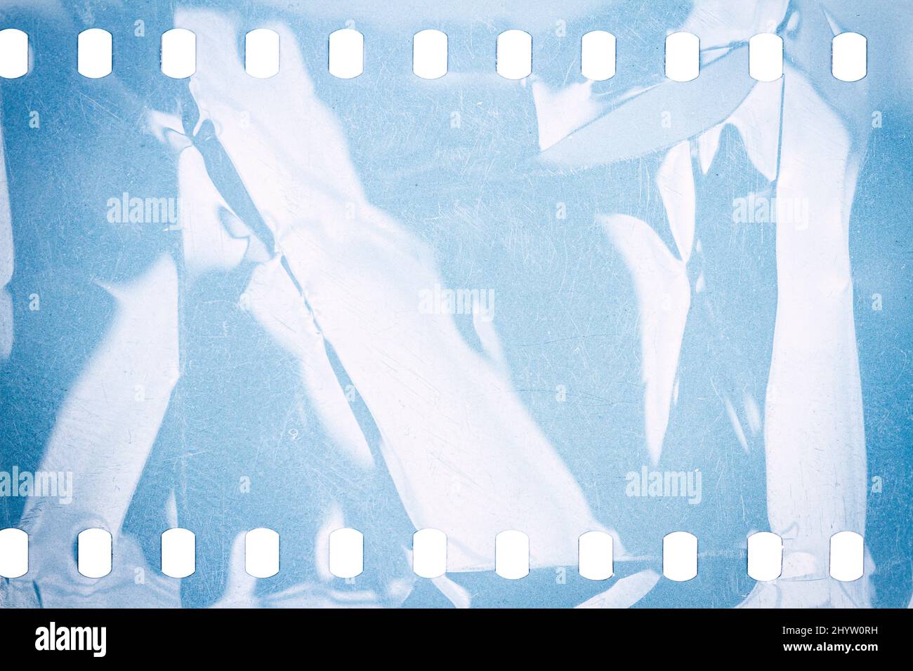 Dusty and grungy 35mm film texture or surface. Perforated scratched ...