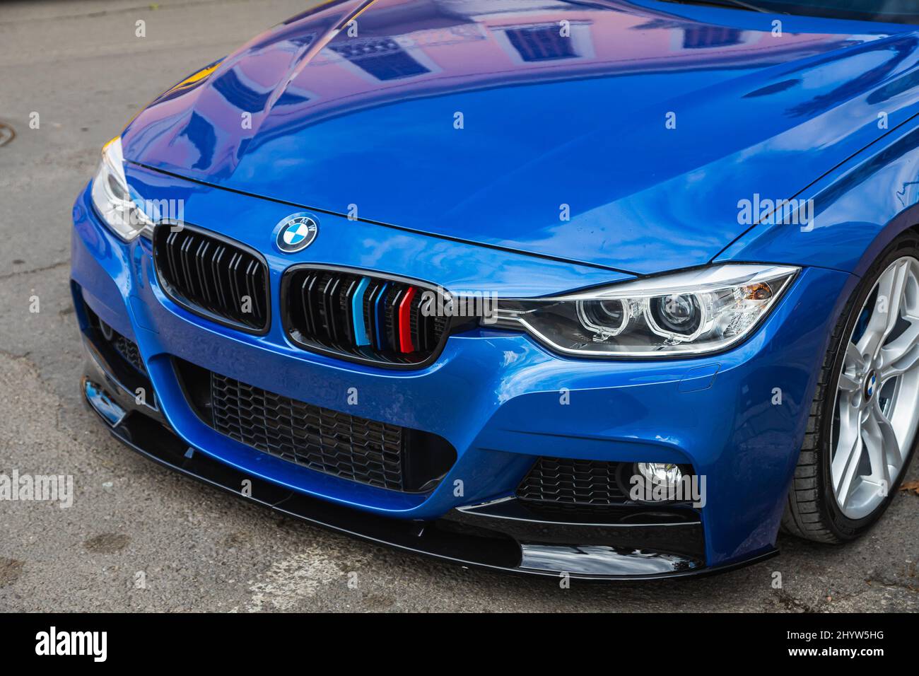 Side; Turkey – February 20 2022: blue BMW 5-series , side glass, wheel ...