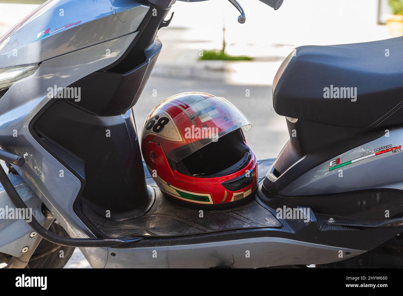 Side, Turkey – February 20 2022:close-up of a red racing helmet on a ...