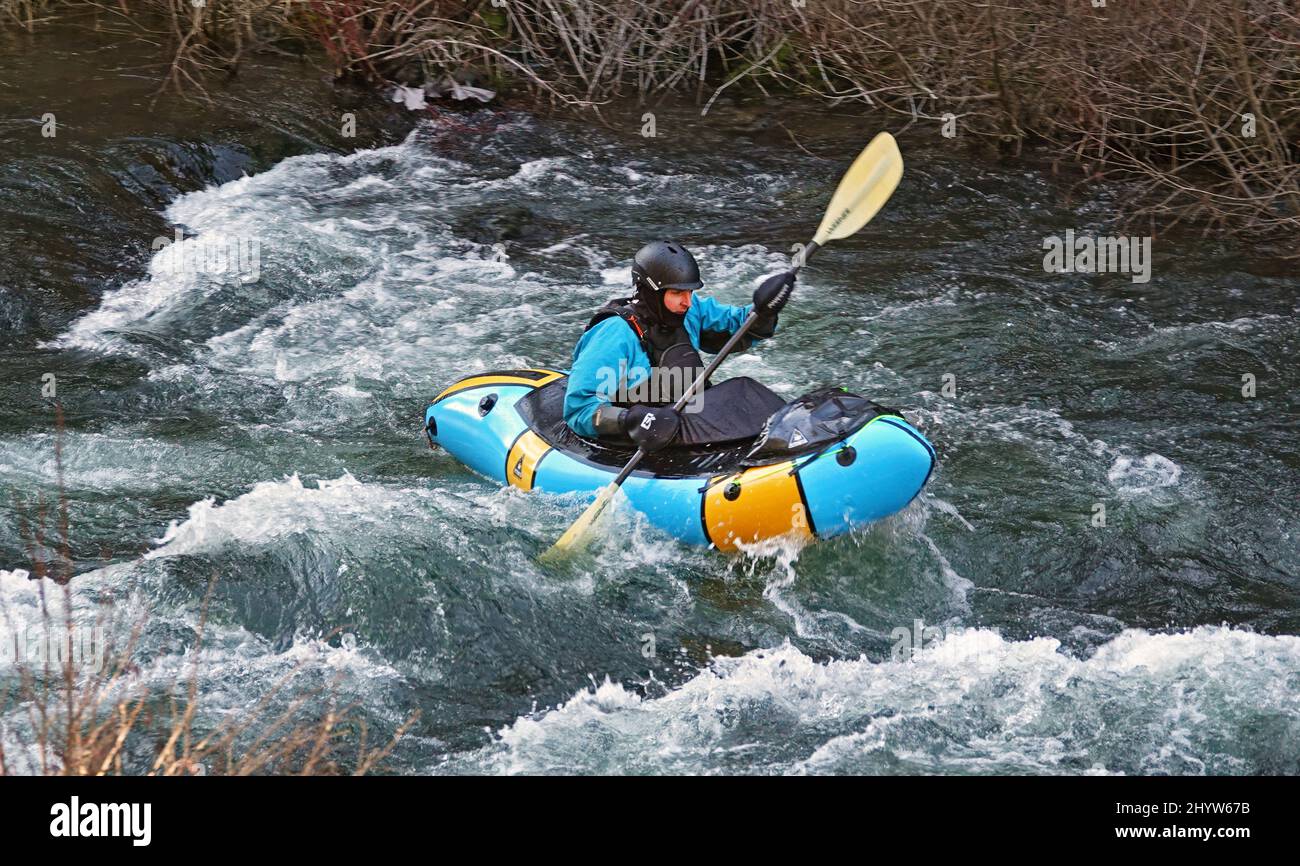 Man wearing suit kayaking hi-res stock photography and images - Alamy