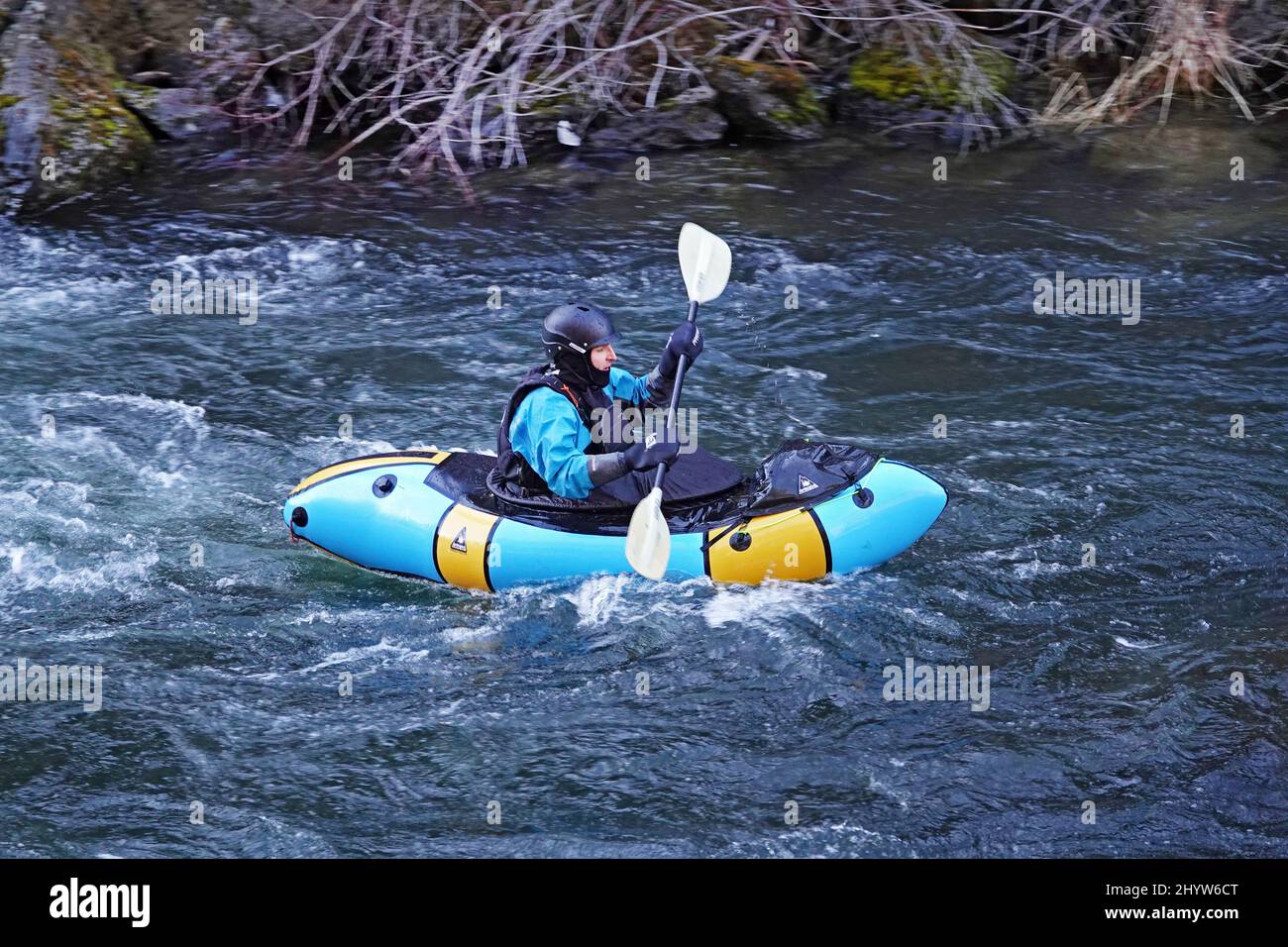 Man wearing suit kayaking hi-res stock photography and images - Alamy