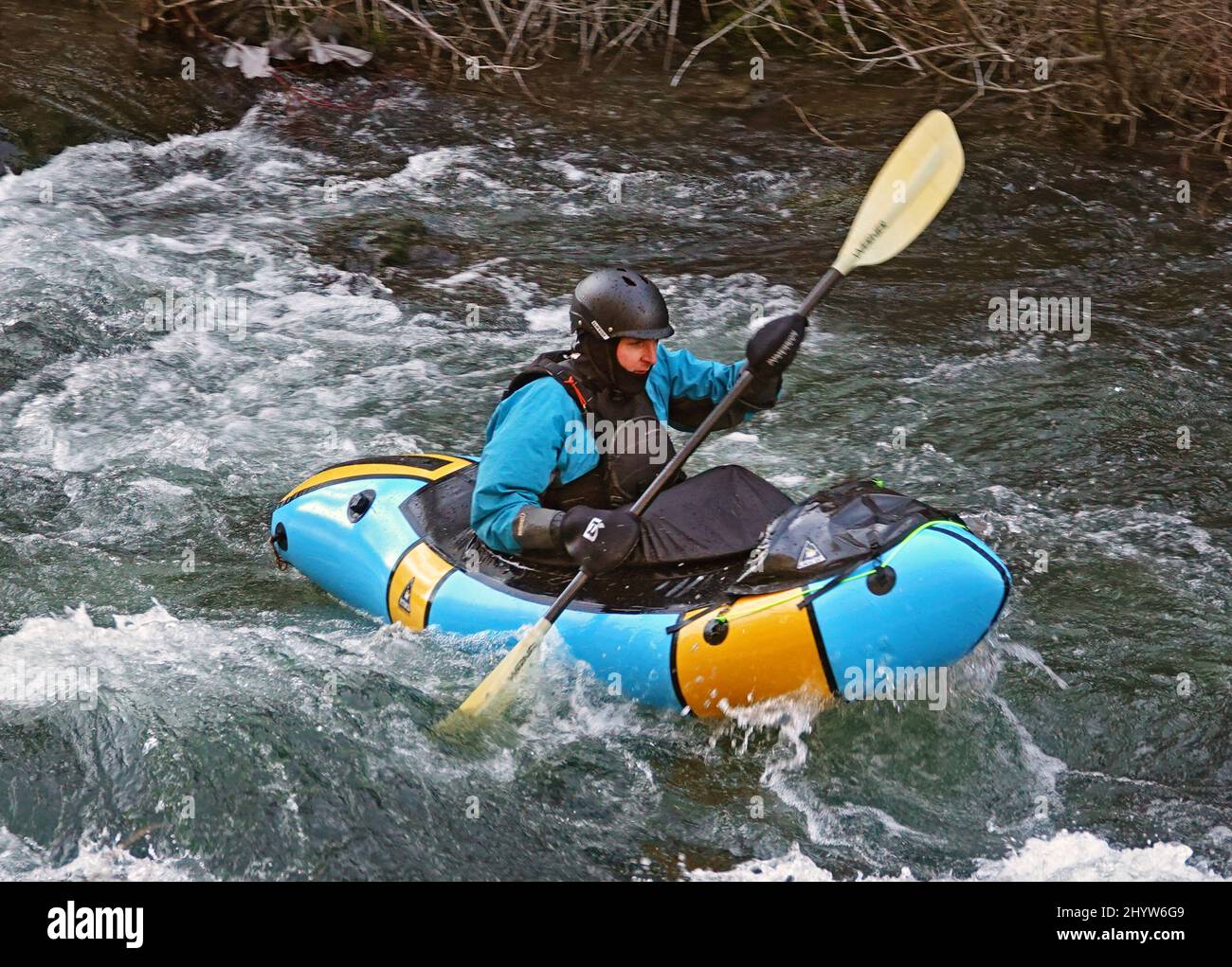 Man wearing suit kayaking hi-res stock photography and images - Alamy