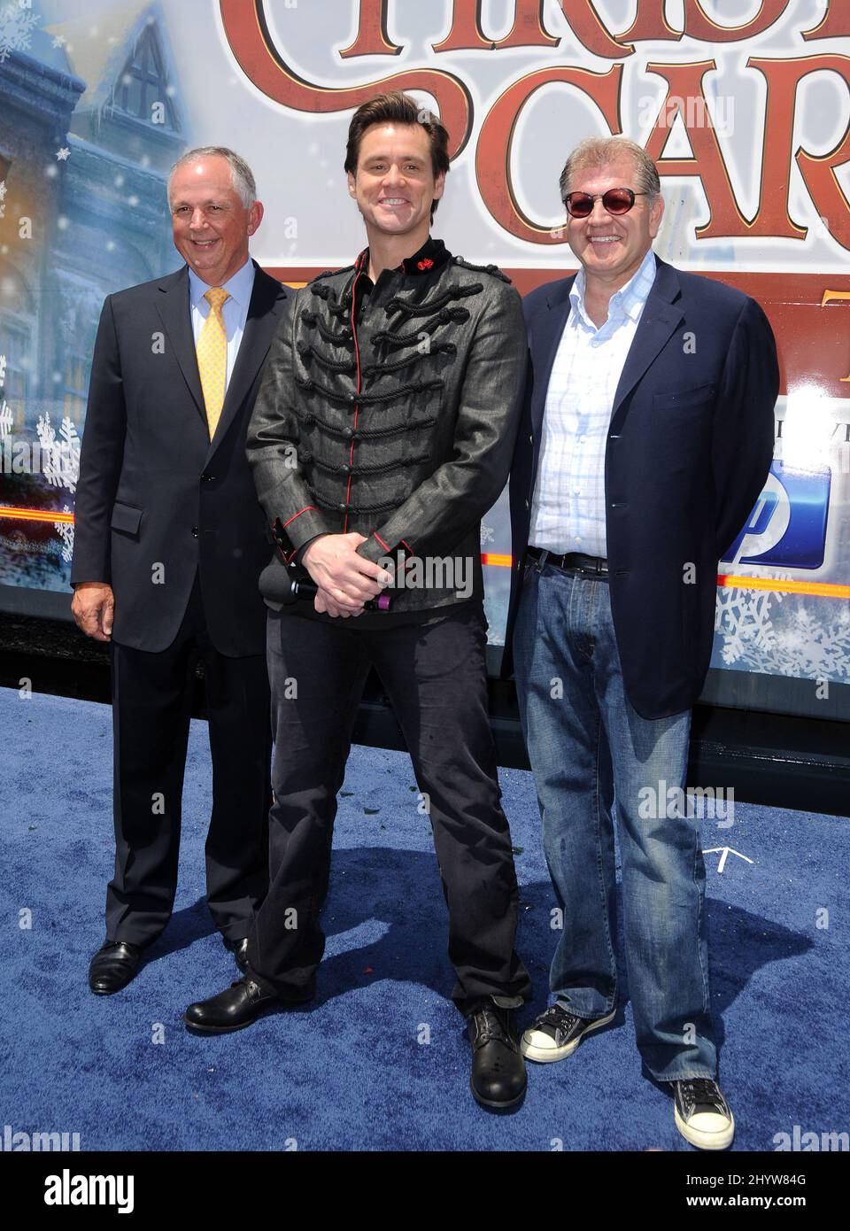 (L-R) Dick Cook, Jim Carrey and Robert Zemeckis at a Press Conference ...