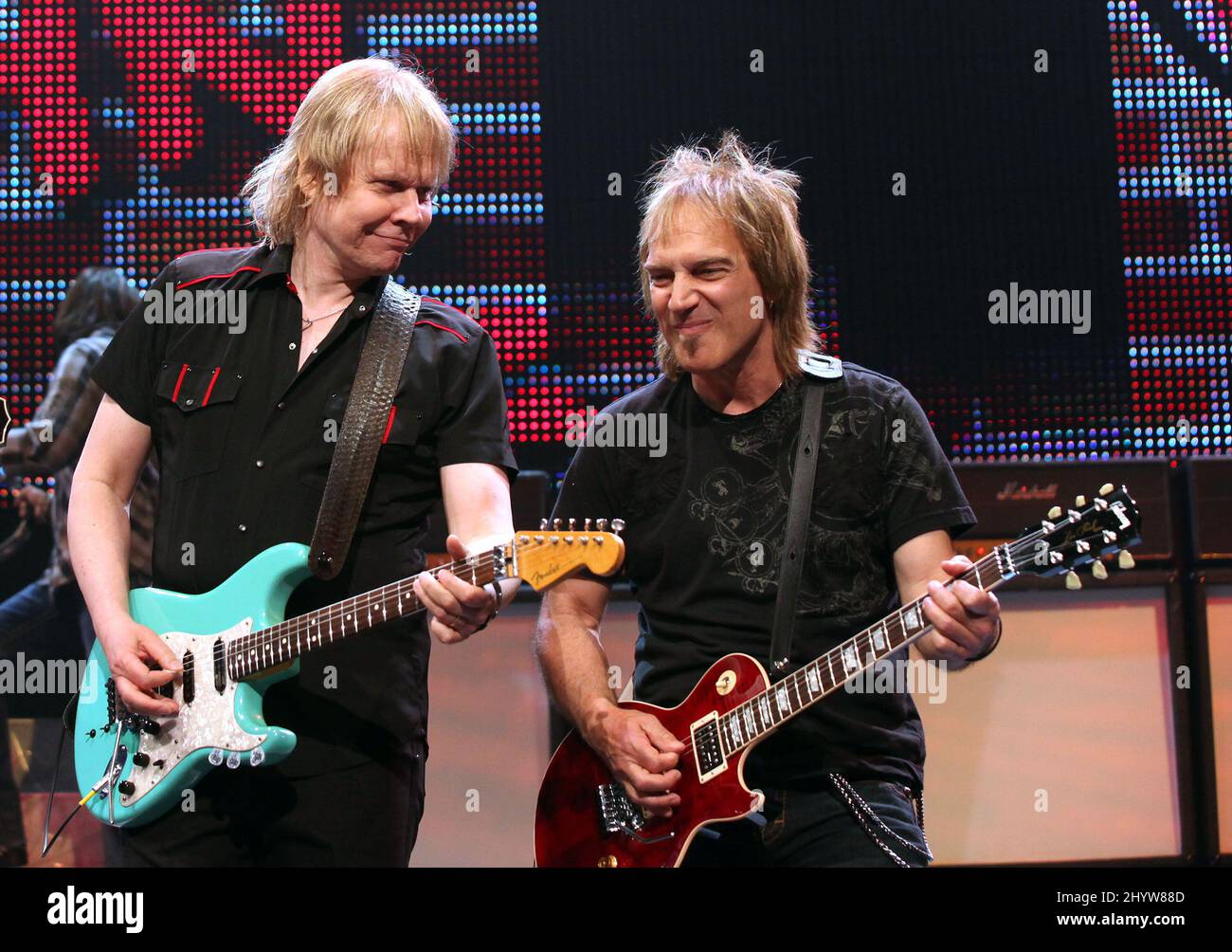 James Young and Dave Amato of REO Speedwagon perform on stage at the ...