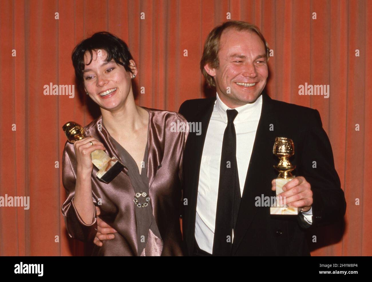 Meg Tilly and Klaus Maria Brandauer at the 43rd Annual Golden Globe ...