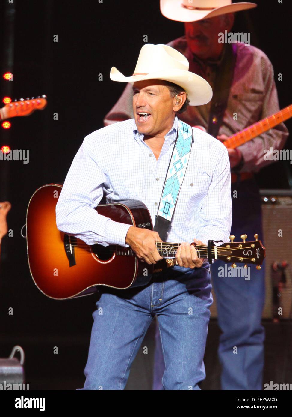 George Strait on stage during the inaugural opening of the new Cowboys ...