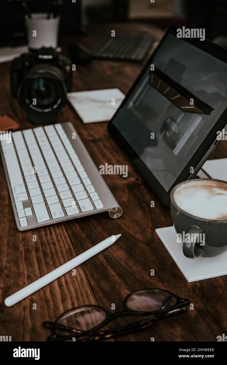 Desk with multiple objects on it Stock Photo - Alamy