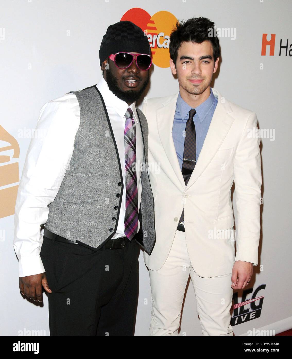 T-Pain and Joe Jonas at the the Annual Clive Davis Pre-Grammy Gala at ...