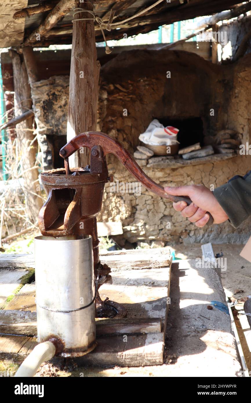 Vintage hand water pump - retro style (old water pump Stock Photo - Alamy