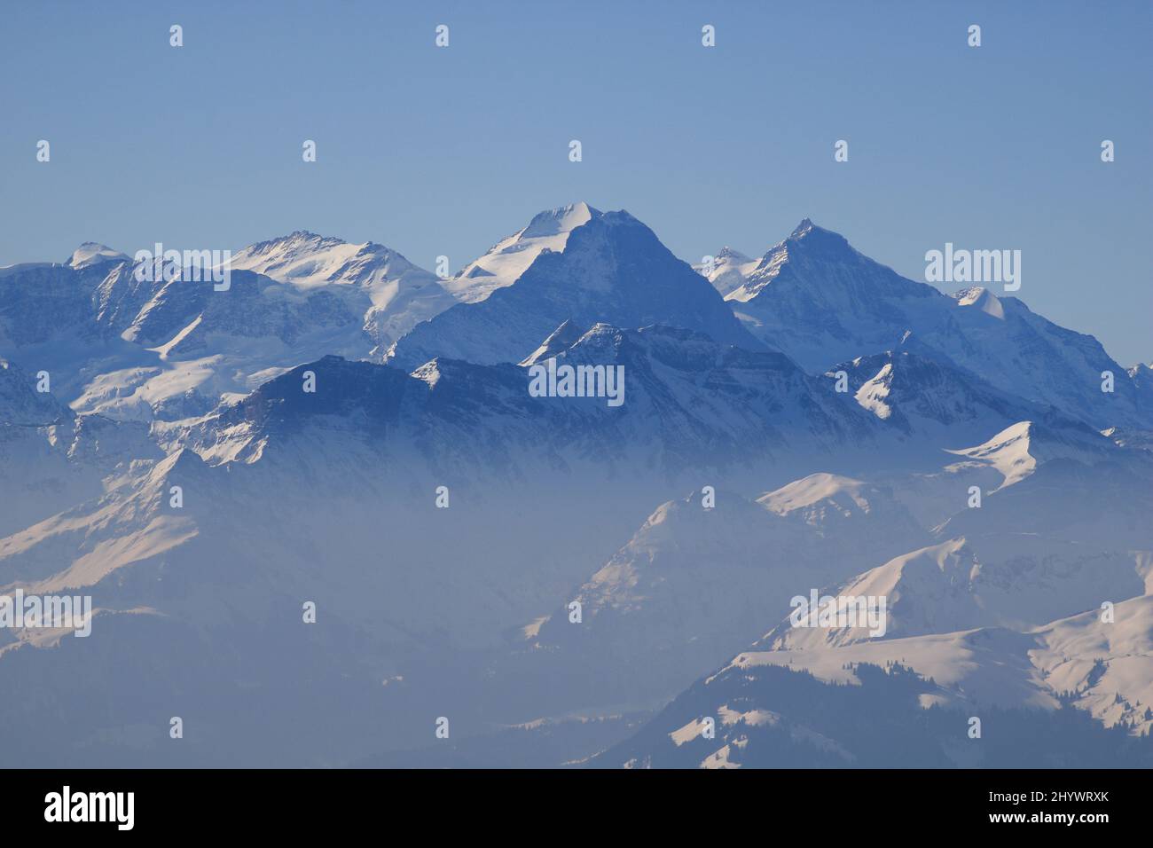 Famous mountain range Eiger, Monch and Jungfrau in winter Stock Photo ...