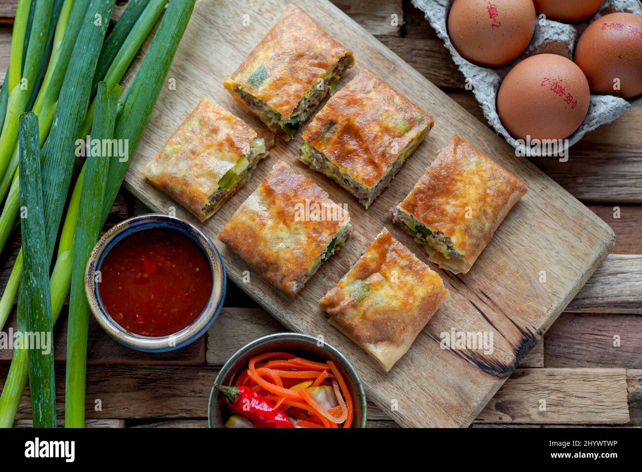 Martabak telur , Indonesian street food. fried wrap filled with eggs ...
