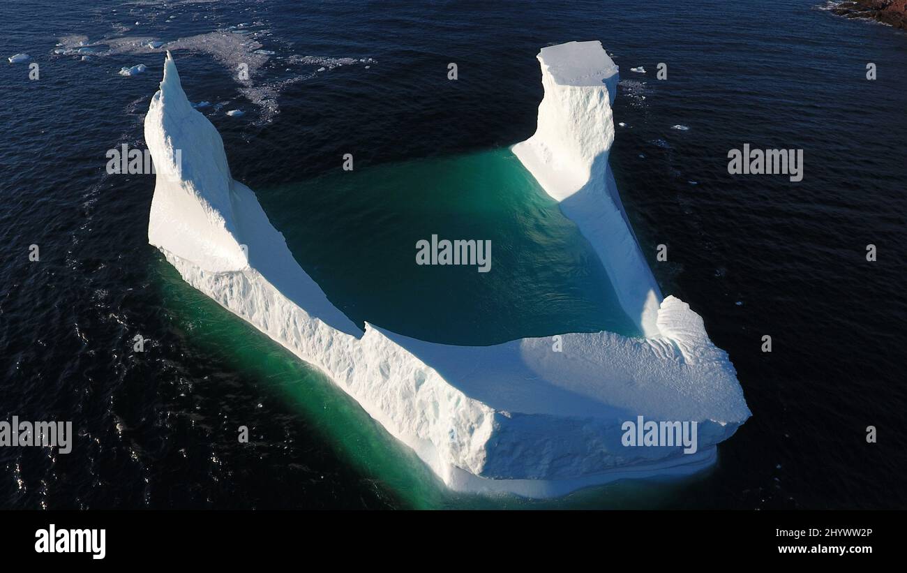 Aerial shot of a gigantic iceberg in the ocean Stock Photo - Alamy