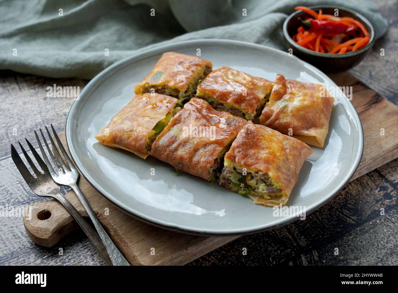 Martabak telur , Indonesian street food. fried wrap filled with eggs ...
