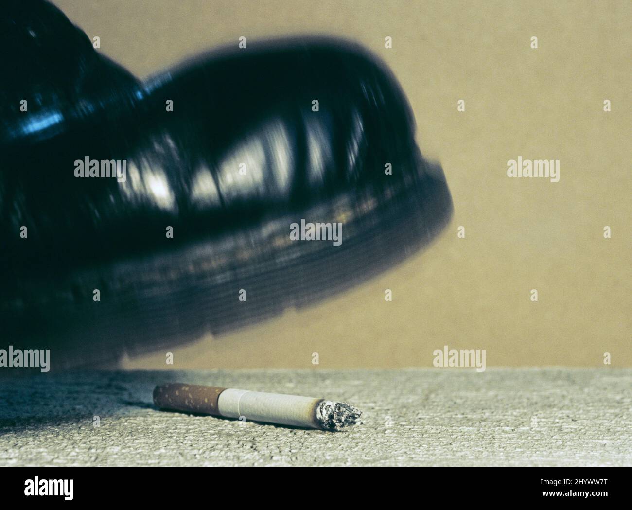 boot puts out cigarette Stock Photo - Alamy