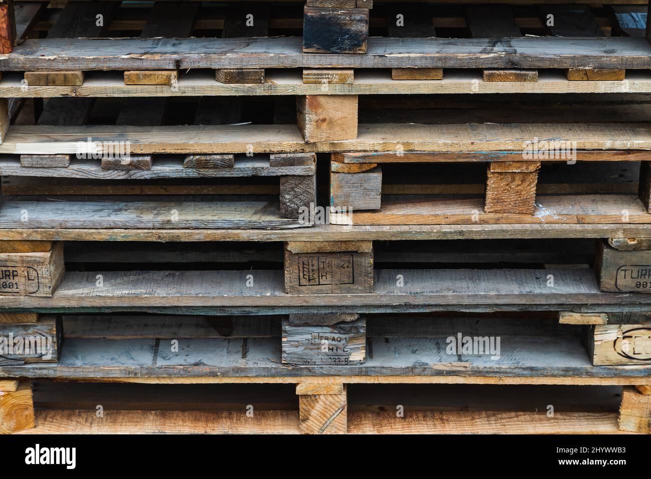 wooden pallets left after building material Stock Photo - Alamy